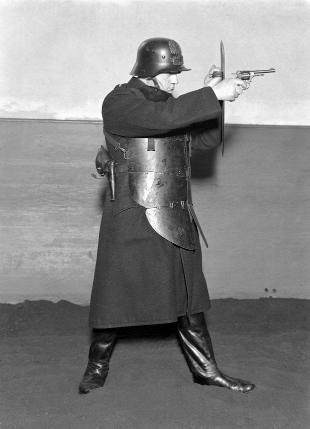 nagant pistol german armor Policeman in full gear, Warsaw’s State ...