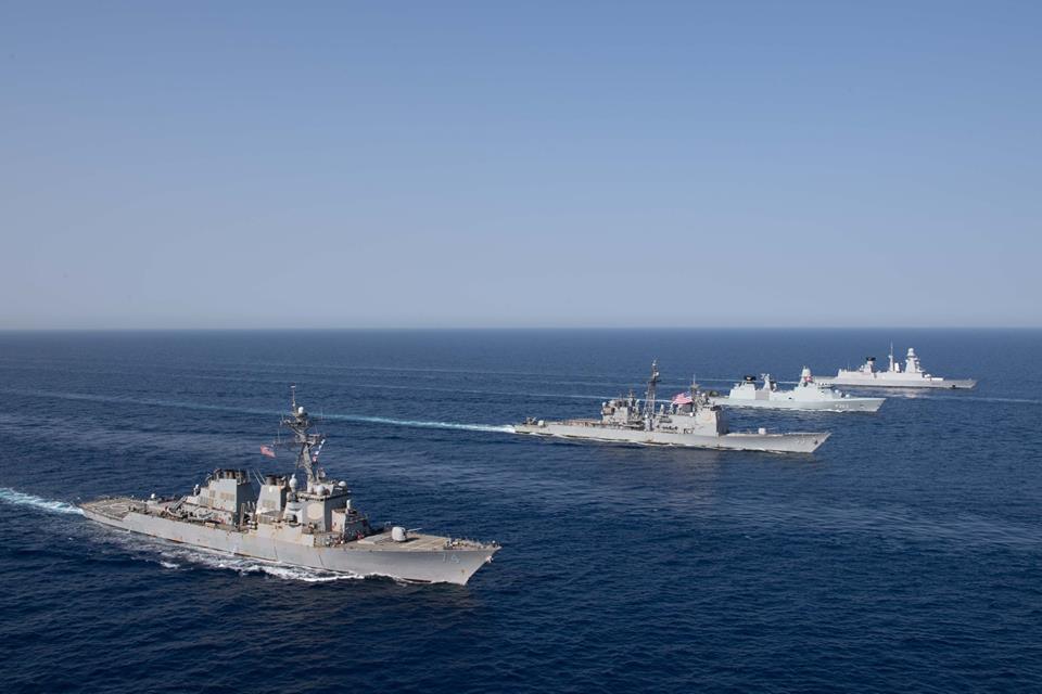 USS McFaul (DDG 74), left, the guided-missile cruiser USS Mobile Bay ...
