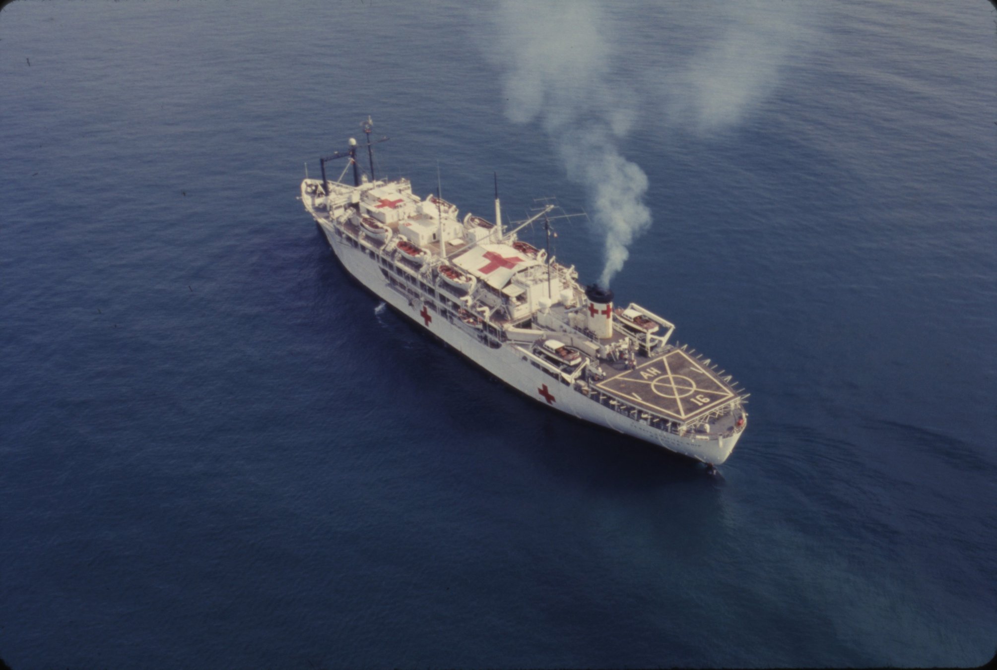 USS Repose (AH 16) is seen in this aerial photo off of South Vietnam ...