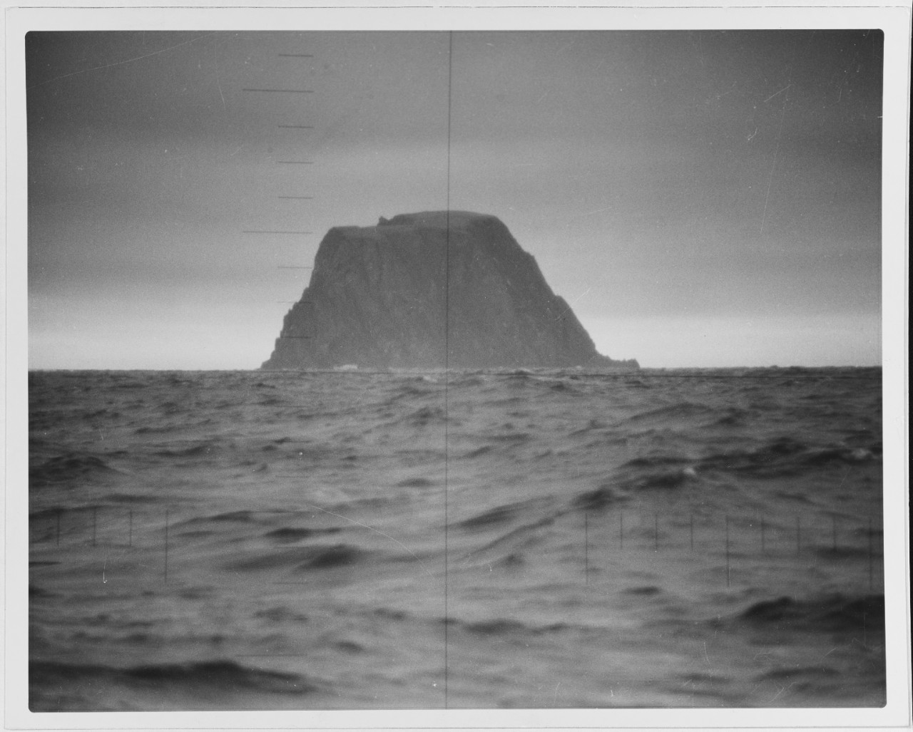 Fairway Rock In the Bering Sea, as seen through the periscope of USS ...
