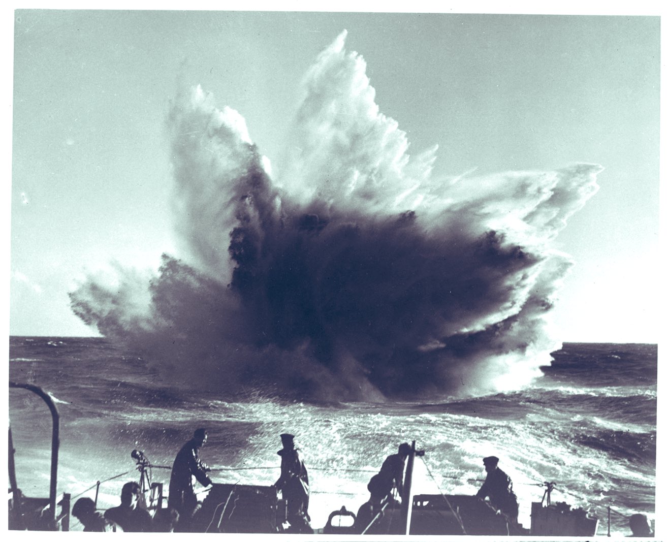 Depth charge exploding astern of HMCS Swansea in January 1944 ...