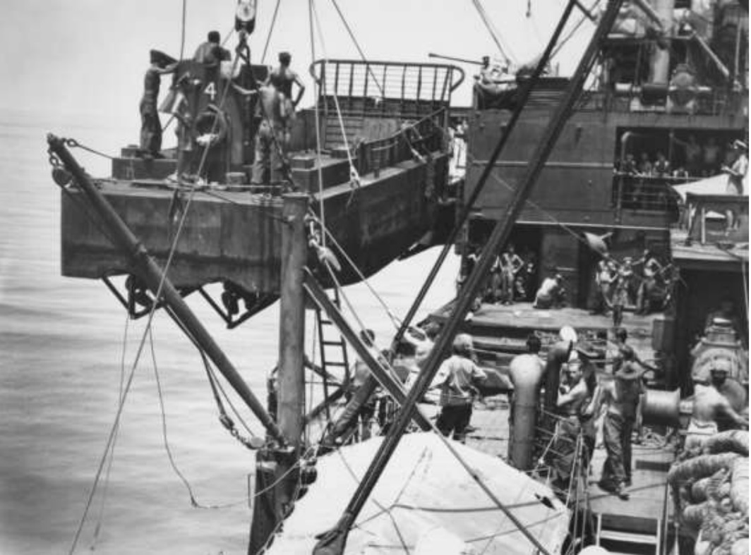 LCVP being swung aboard HMAS Westralia during the landing of 2 4 ...