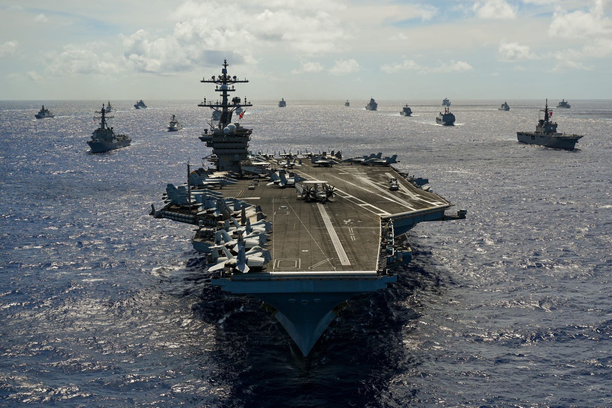 USS Carl Vinson (CVN 70) leads a formation of warships during RIMPAC ...