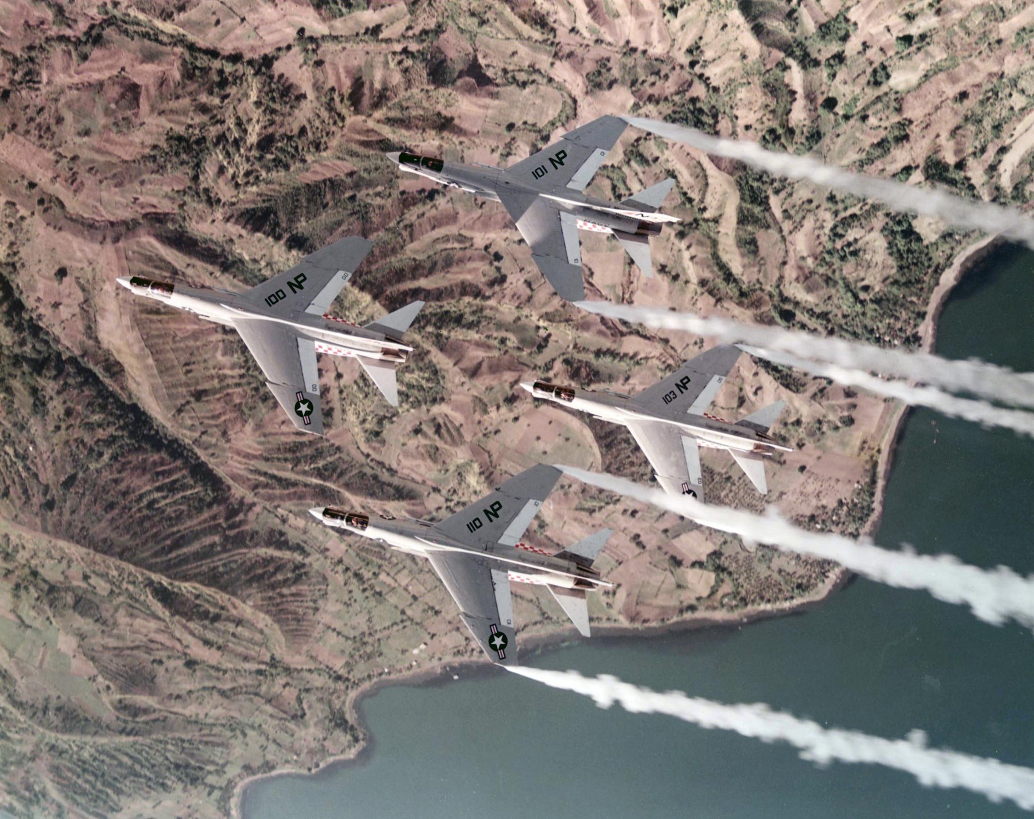 VF-24 Fighting Checkmates F-8 Crusaders flying a diamond formation NP ...