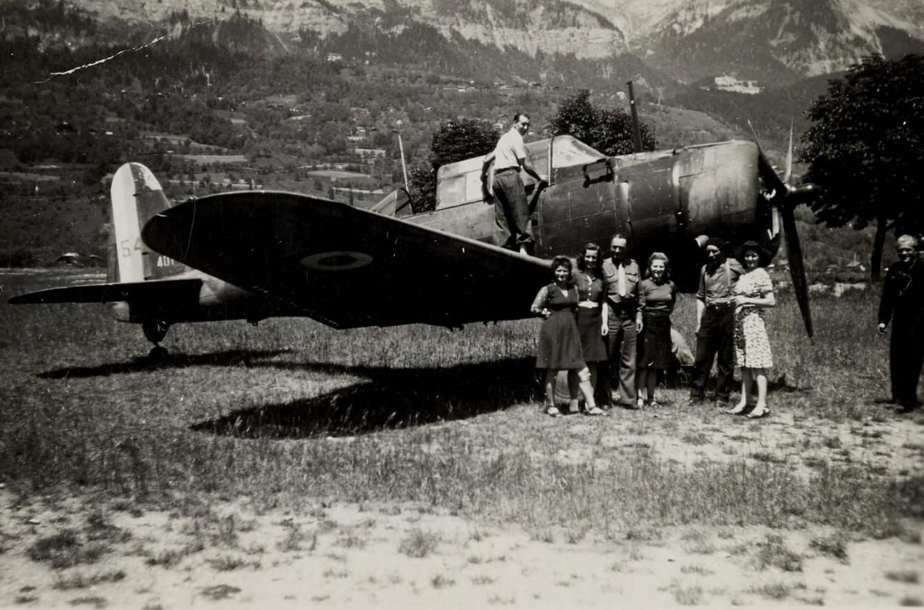battered French Douglas-SBD-5 crew pose with locals in the Auvergne ...